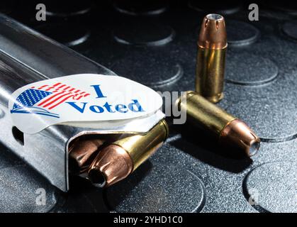 I voted sticker on a loaded stainless steel magazine that is loaded ...