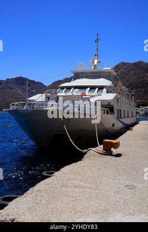 The Panagia Evaggelistria small ferry boat moored at Livadia harbour ...