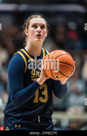 Notre Dame forward Kate Koval (13) drives as Wake Forest forward ...