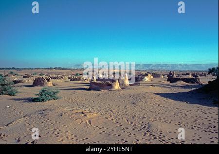 Gravestones, graveyard, tourism centre Mut 3, main town El Qasr of ...