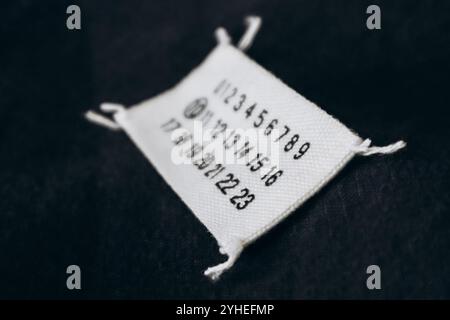 The famous Maison Margiela label with numbers and four stitches Stock ...