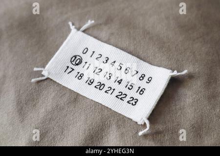 The famous Maison Margiela label with numbers and four stitches Stock ...