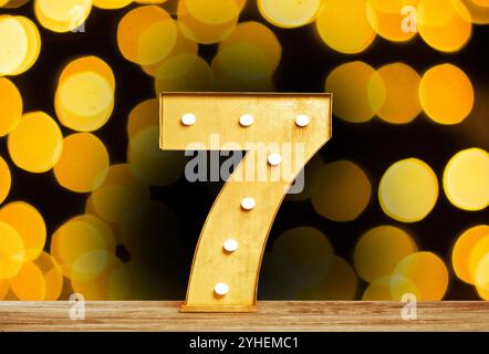 Big plastic numbers with shining light bulbs Stock Photo - Alamy