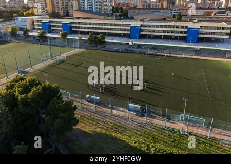 Aerial view of amateur soccer match at sunset Stock Photo - Alamy