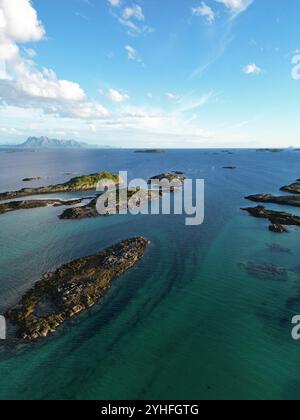 Vertical Drone Shot, Half sea ocean with islands, half sky with light ...
