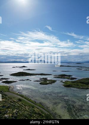 A drone vertical shot of a small road in a rural village in the ...
