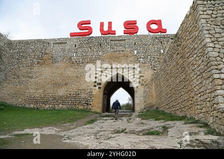 Tourist walking towards the Ganja Gate of Shusha Fortress in the ...