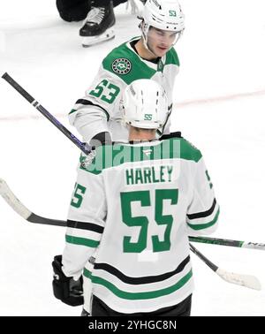 Dallas Stars' Thomas Harley (55) holds Vancouver Canucks' Elias ...