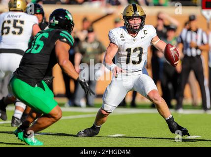 Army quarterback Bryson Daily (13) runs for a first down against ...
