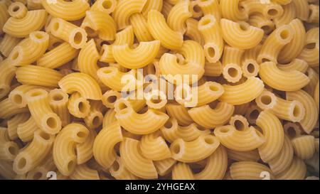 Macaroni pasta elbows cooked texture detail close up Stock Photo - Alamy