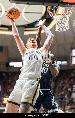 Purdue center Will Berg (44) shoots over Rutgers forward Bryce Dortch ...