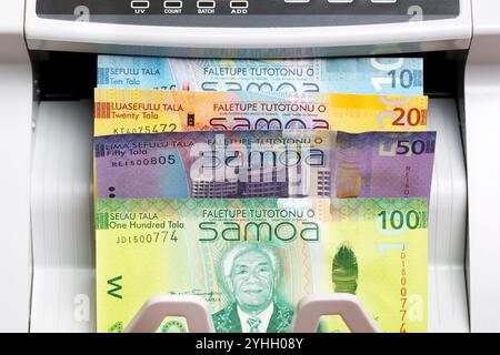 Samoan money - tala in the counting machine Stock Photo - Alamy