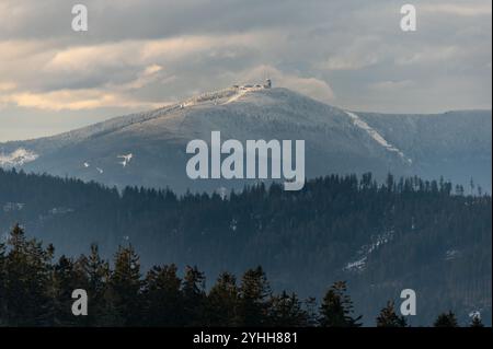 Panorama of mountain peaks above inversion with sunrise and morning ...