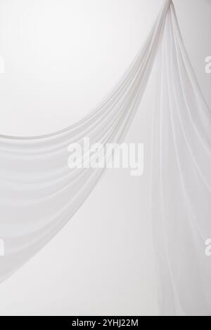 Draped fabric on white background Stock Photo - Alamy