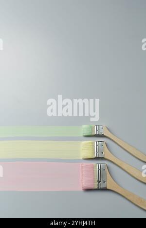 Three coloured lines painted with a brush Stock Photo - Alamy