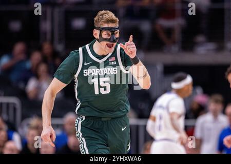 Michigan State's Carson Cooper celebrates a win during an NCAA college ...