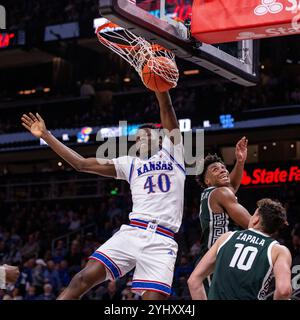 Kansas forward Flory Bidunga (40) tries to shoot over Kansas State ...