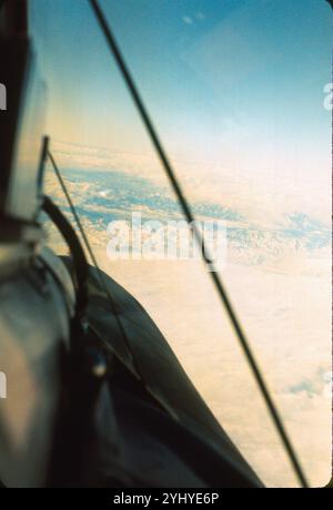 F-106A pilot eye view of clouds formations through right side of flat ...