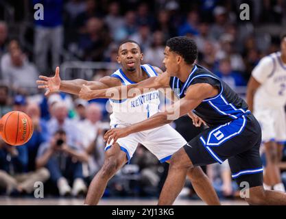 Duke guard Caleb Foster (1) defends the ball from Virginia guard Dai ...