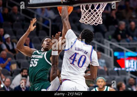 Kansas forward Flory Bidunga (40) plays during an NCAA college ...