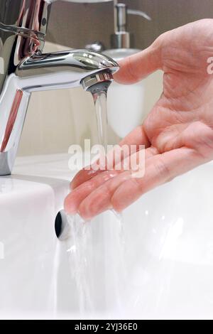Washbasin for hand washing / sink mixer tap, in toilet cubicle / loo ...