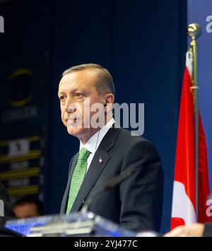 Turkish President Recep Tayyip Erdogan (L) greets German Chancellor ...