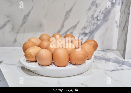 front view of the kitchen marble countertop with cans of coffee and a ...