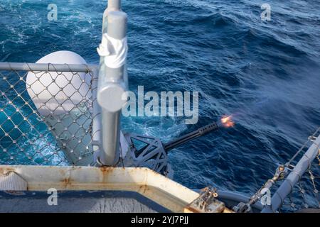 The aft close-in weapons system fires off the port side of USS Iwo Jima ...
