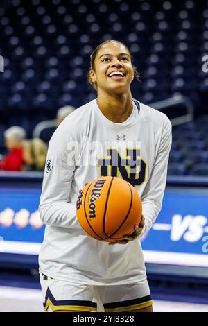 Notre Dame guard Cassandre Prosper (8) looks to shoot as Louisville ...
