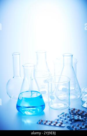 Triangular flasks and beaker Stock Photo - Alamy
