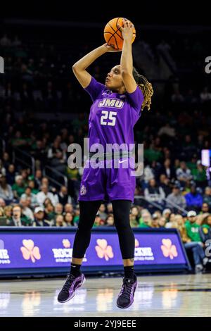 James Madison guard Jamia Hazell (25) grabs a rebound against Marshall ...