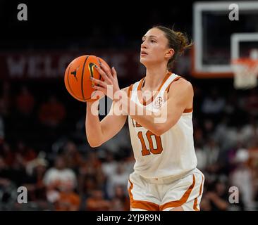 Texas' Shay Holle (10) shoots while pressured by Kentucky's Amelia ...