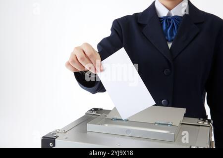 Female student voting Stock Photo - Alamy