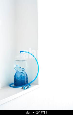 Blue hydration placed within a white frame Stock Photo - Alamy