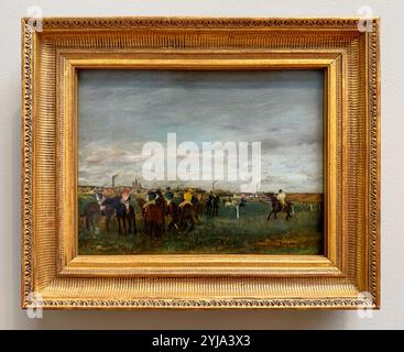 The Races, by Edgar Degas. Jockeys preparing to race horses near ...