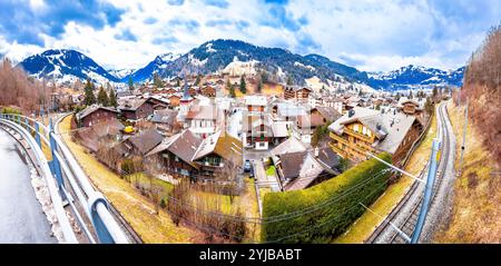 Idyllic village of Gstaad rooftops view, luxury winter destination in ...