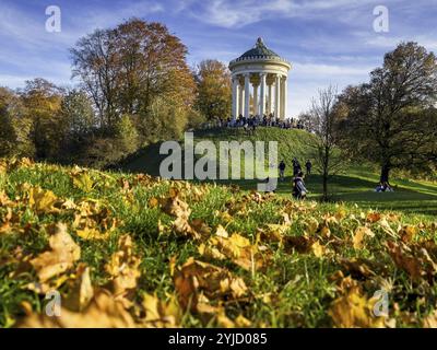 English Garden, Monopterus in autumn against the sun, Munich, Germany ...
