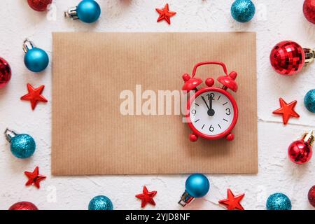 Gift box with Christmas balls, envelope and candy cane on blue ...