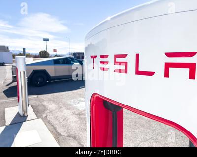 Side View of Tesla Cybertruck Charging at Supercharger Station Stock ...