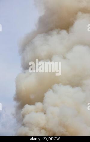 Massive Smoke Plume Over Scrap Metal Fire with Response Vehicles Eye ...