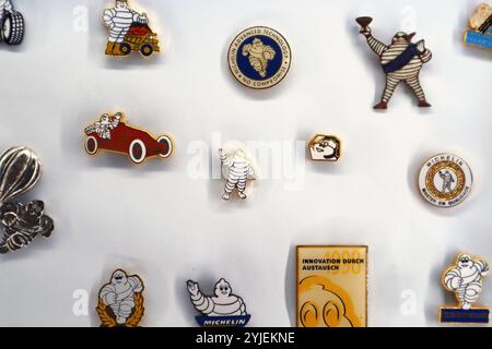 Vintage Michelin badges featuring their mascot Bibendum Stock Photo - Alamy