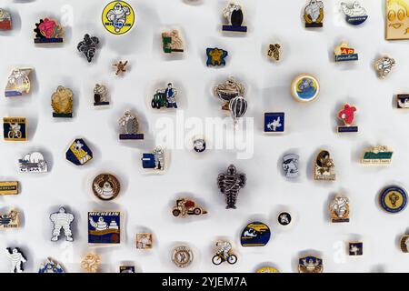Vintage Michelin badges featuring their mascot Bibendum Stock Photo - Alamy