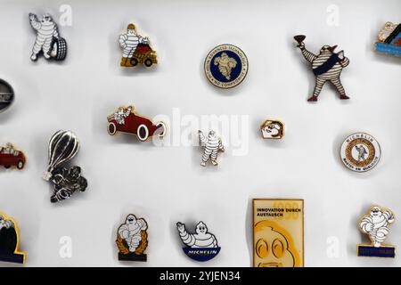 Vintage Michelin badges featuring their mascot Bibendum Stock Photo - Alamy