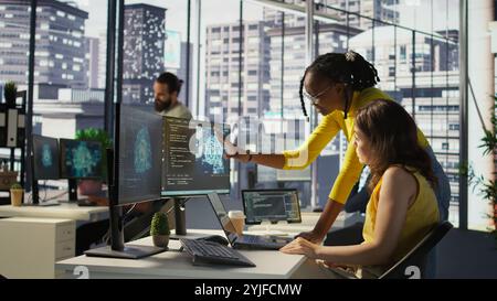 Admin and coworker conducting experiments and tests to optimize AI ...