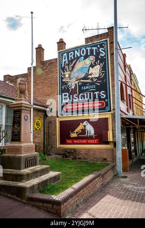 Vintage advertising signs as street murals in the small town of ...