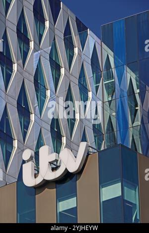 ITV logo on building, Media City, Salford Quays Stock Photo - Alamy