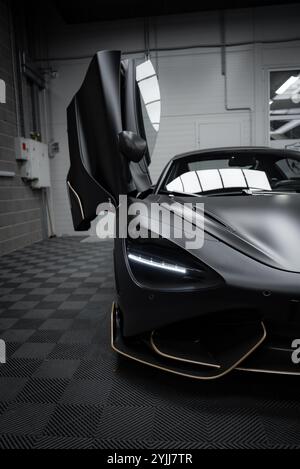 McLaren 720S with Dihedral Doors Open in Luxury Showroom Stock Photo ...