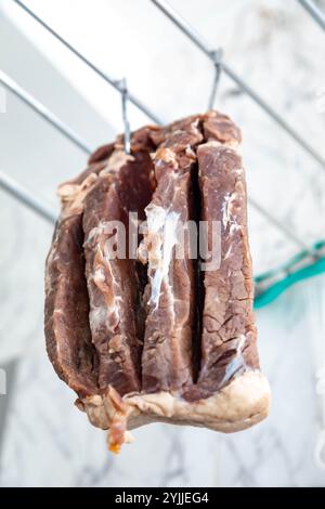 Traditional salted and aged sun-dried meat Stock Photo - Alamy