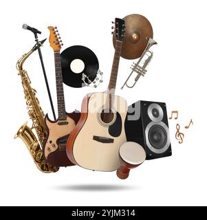 Different musical instruments in air on white Stock Photo - Alamy