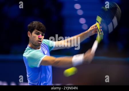 Spain's Carlos Alcaraz returns the ball to United States' Taylor Fritz ...